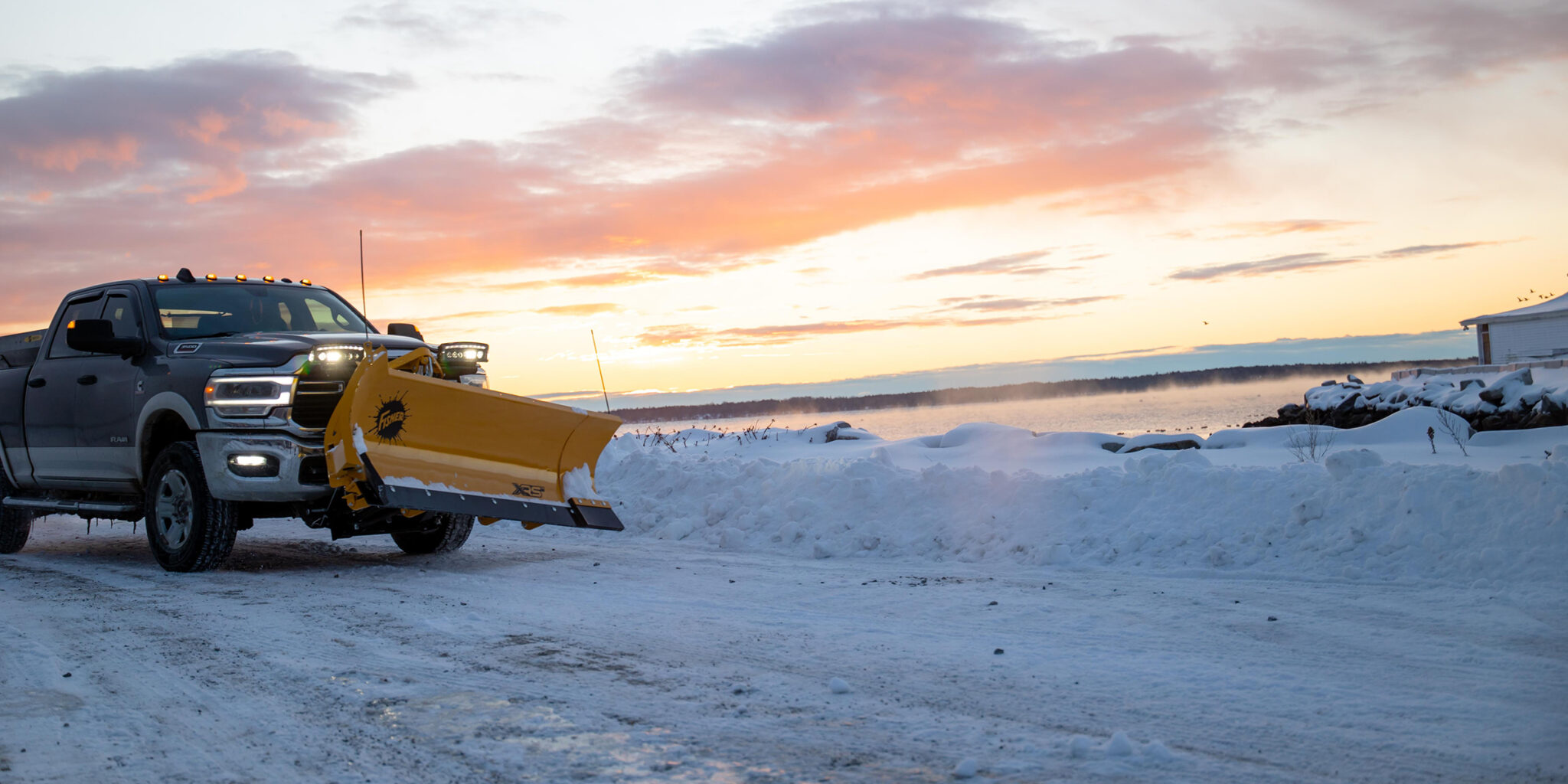 XRS™ Winged Snow Plow for Skid-Steers | FISHER®